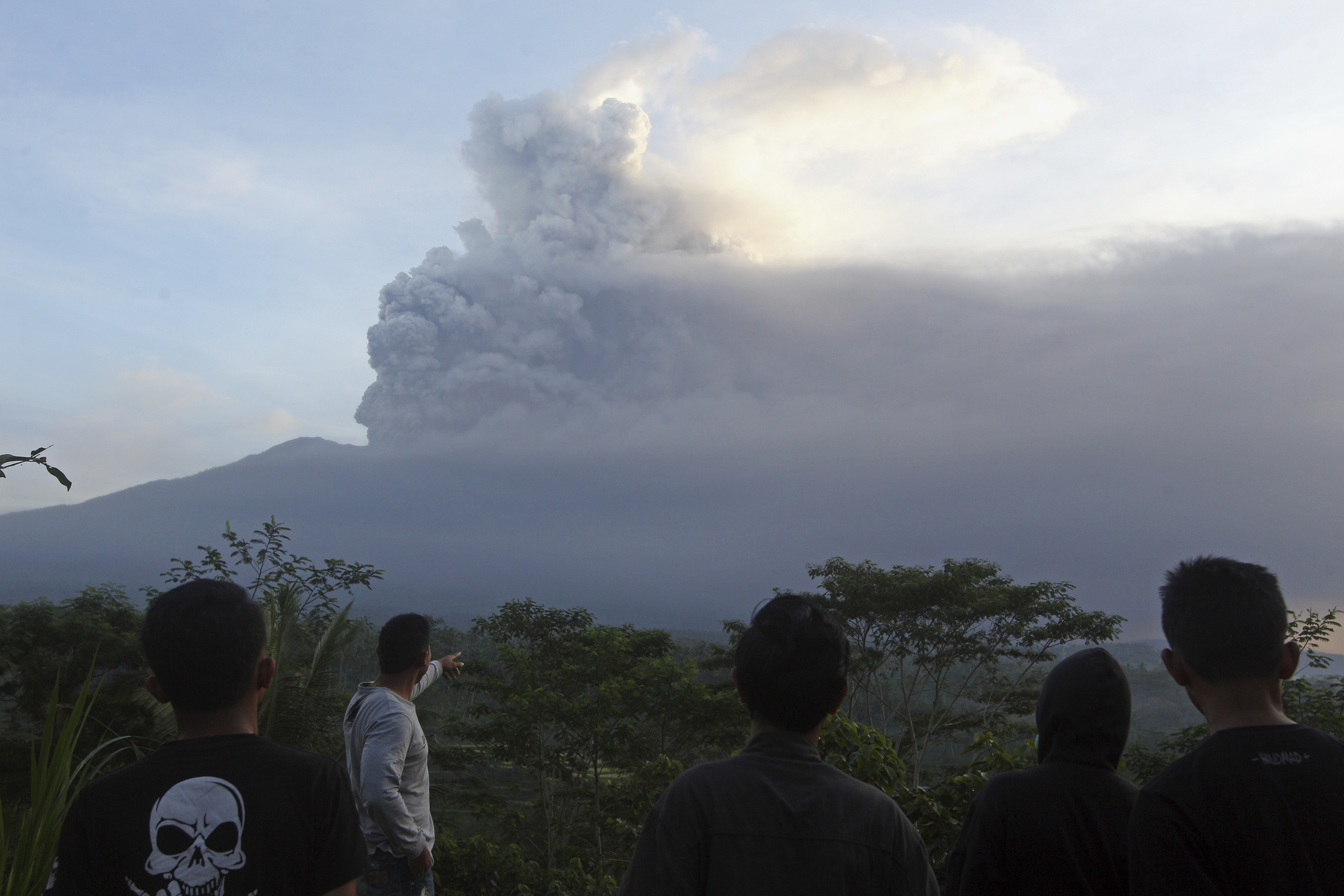 Bali volcano shifts to magma eruptions, forcing evacuations and ...