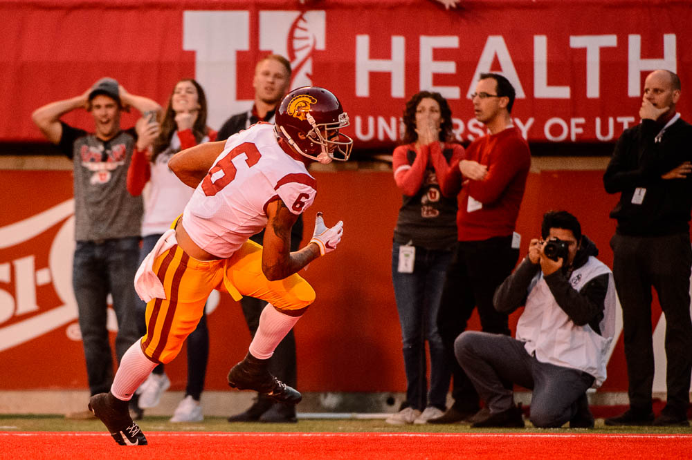 Utes overcome slow start to dominate USC 41-28 and move into a tie for ...